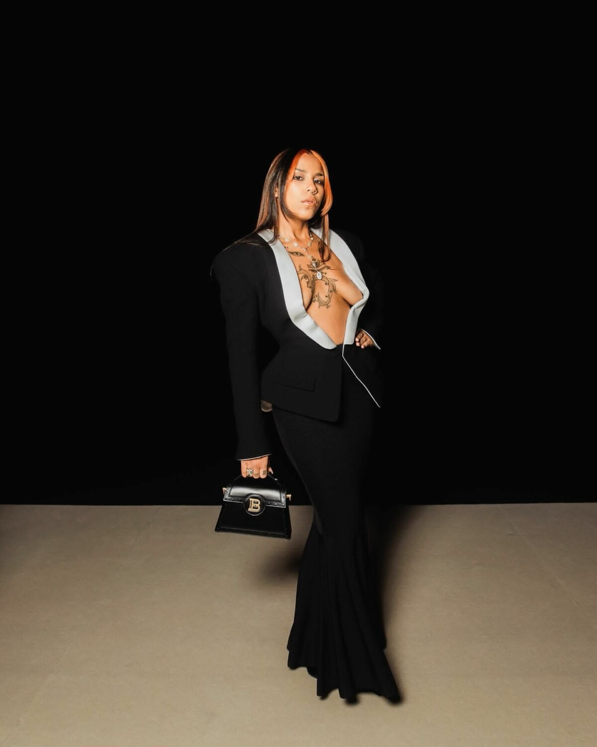 Tokischa presente en el desfile de Balmain